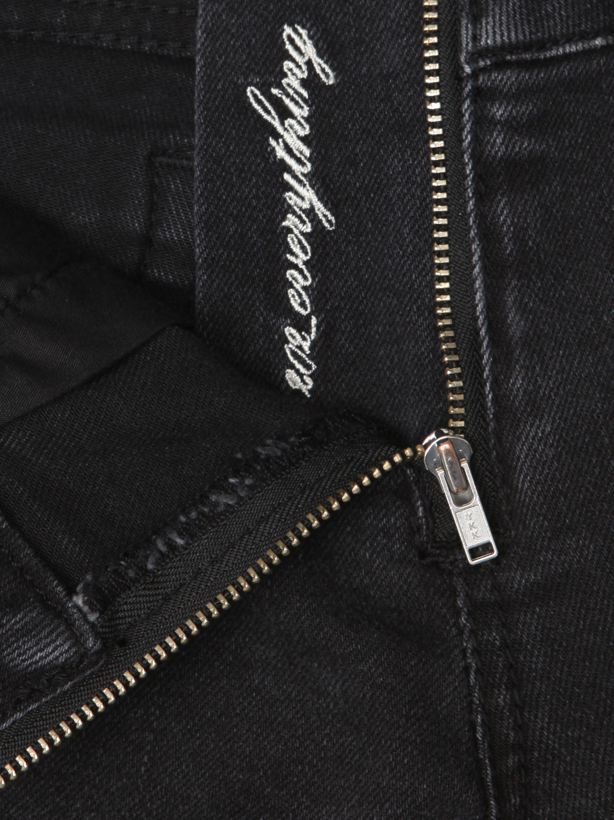 CROSS BACK FLARE JEANS BLACK | SCHISM INDUCING