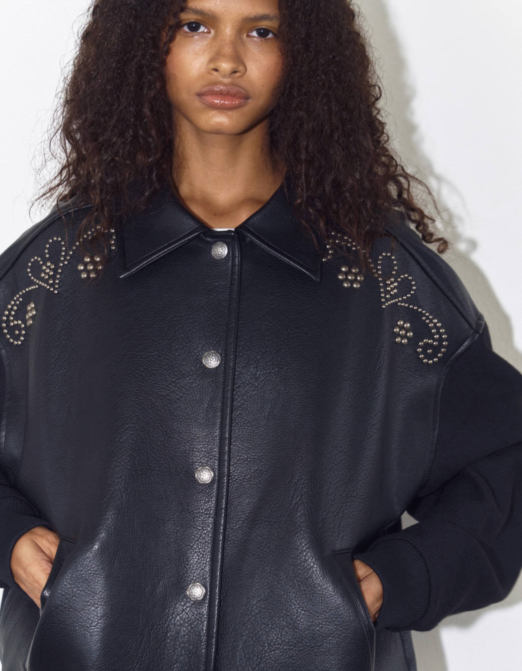 HEART STUDDED VARSITY JACKET_ONZI_EDITION, BLACK | polysooem