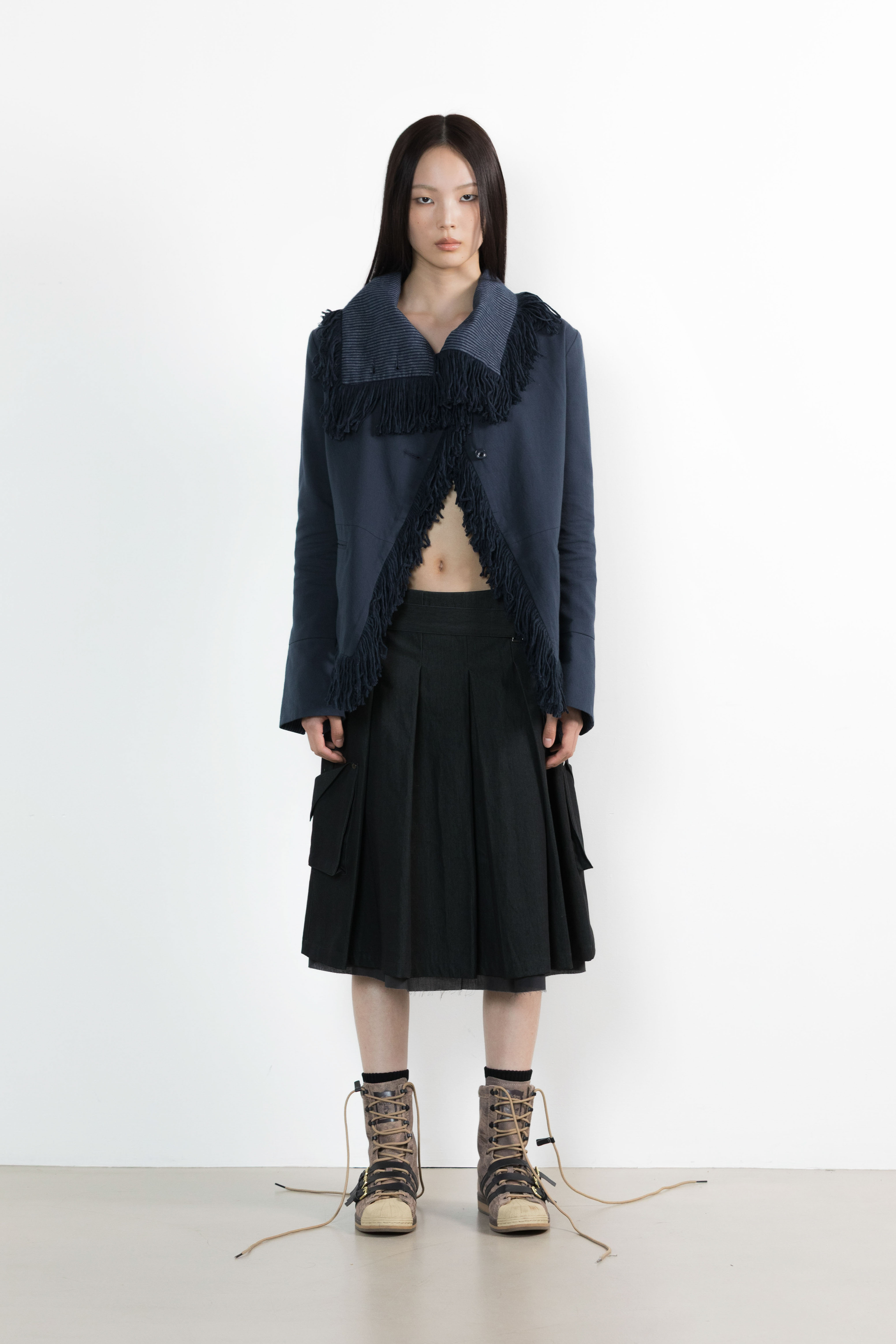 WET TAG | SLANTED POCKET BELTED PLEATS SKIRT